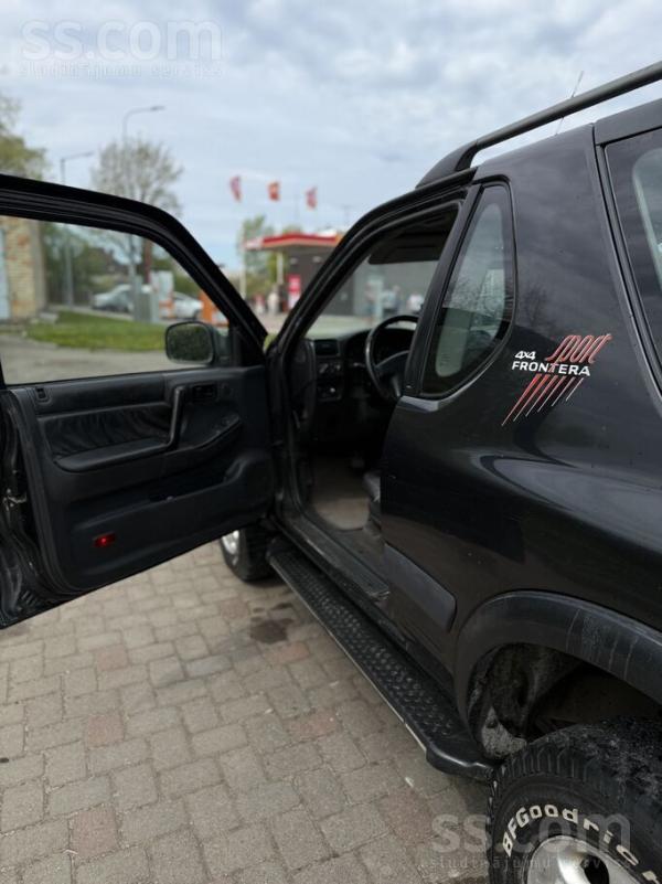 Black Opel Frontera Sport 2000 in Liepaja, with an engine capacity of 2.20 L and mileage of 184 thousand km for 2800 €, photo 7 on AUTOMOTO.COM.LV