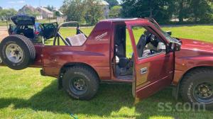 Red Opel Frontera Sport 1993 in Riga, with an engine capacity of 2.00 L and mileage of 189 thousand km for 3300 €, photo 2 on AUTOMOTO.COM.LV