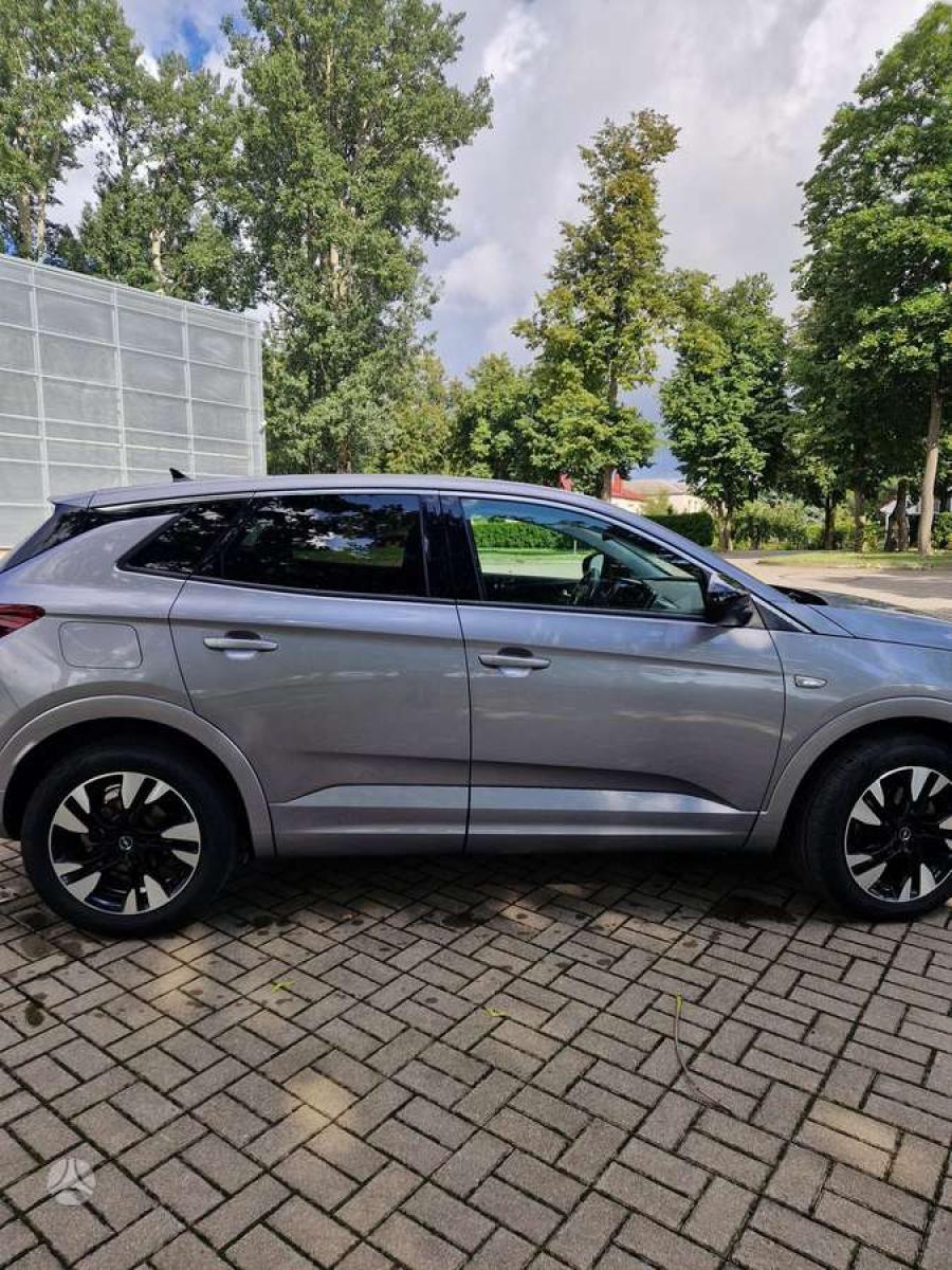 Grey Opel Grandland 2023 in Marijampole, with an engine capacity of 1.20 L and mileage of 167 thousand km for 13552 €, photo 5 on AUTOMOTO.COM.LV
