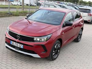 Red Opel Grandland 2023 in Marijampole, with an engine capacity of 1.20 L and mileage of 128 thousand km for 14762 €, photo 3 on AUTOMOTO.COM.LV