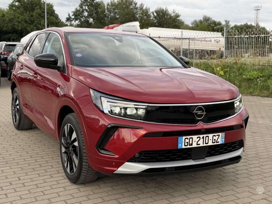 Red Opel Grandland 2023 in Marijampole, with an engine capacity of 1.20 L and mileage of 128 thousand km for 14762 €, photo 6 on AUTOMOTO.COM.LV