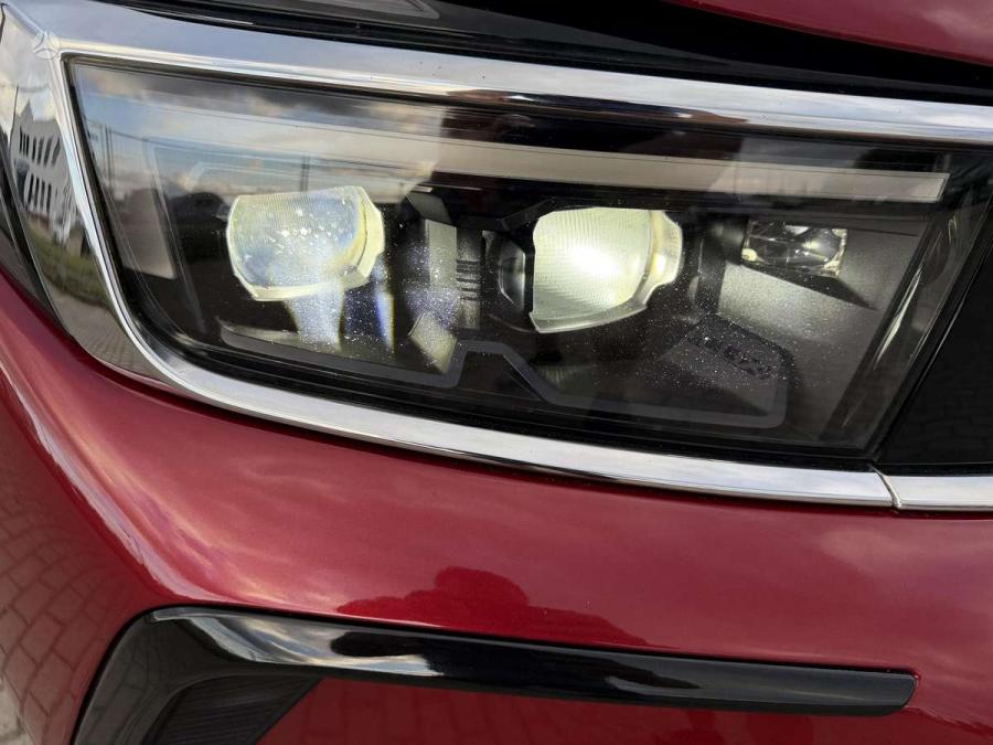 Red Opel Grandland 2023 in Marijampole, with an engine capacity of 1.20 L and mileage of 128 thousand km for 14762 €, photo 7 on AUTOMOTO.COM.LV