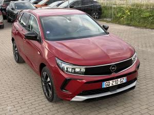 Red Opel Grandland 2023 in Marijampole, with an engine capacity of 1.20 L and mileage of 128 thousand km for 14762 €, photo 8 on AUTOMOTO.COM.LV
