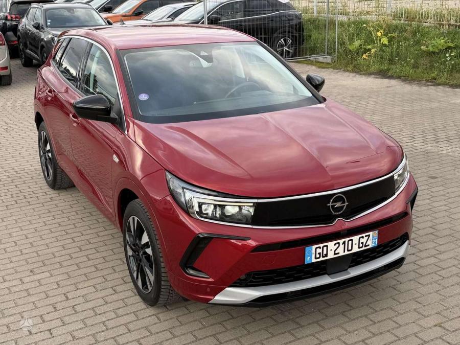 Red Opel Grandland 2023 in Marijampole, with an engine capacity of 1.20 L and mileage of 128 thousand km for 14762 €, photo 8 on AUTOMOTO.COM.LV