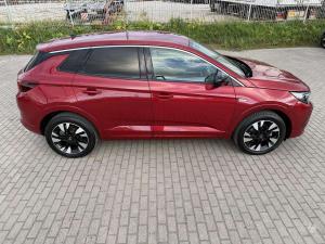 Red Opel Grandland 2023 in Marijampole, with an engine capacity of 1.20 L and mileage of 128 thousand km for 14762 €, photo 9 on AUTOMOTO.COM.LV