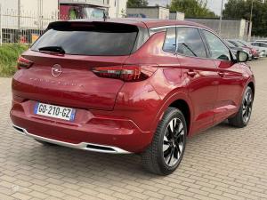 Red Opel Grandland 2023 in Marijampole, with an engine capacity of 1.20 L and mileage of 128 thousand km for 14762 €, photo 10 on AUTOMOTO.COM.LV