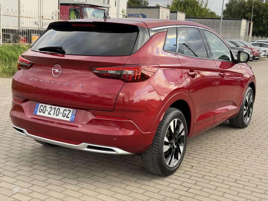 Red Opel Grandland 2023 in Marijampole, with an engine capacity of 1.20 L and mileage of 128 thousand km for 14762 €, photo 10 on AUTOMOTO.COM.LV