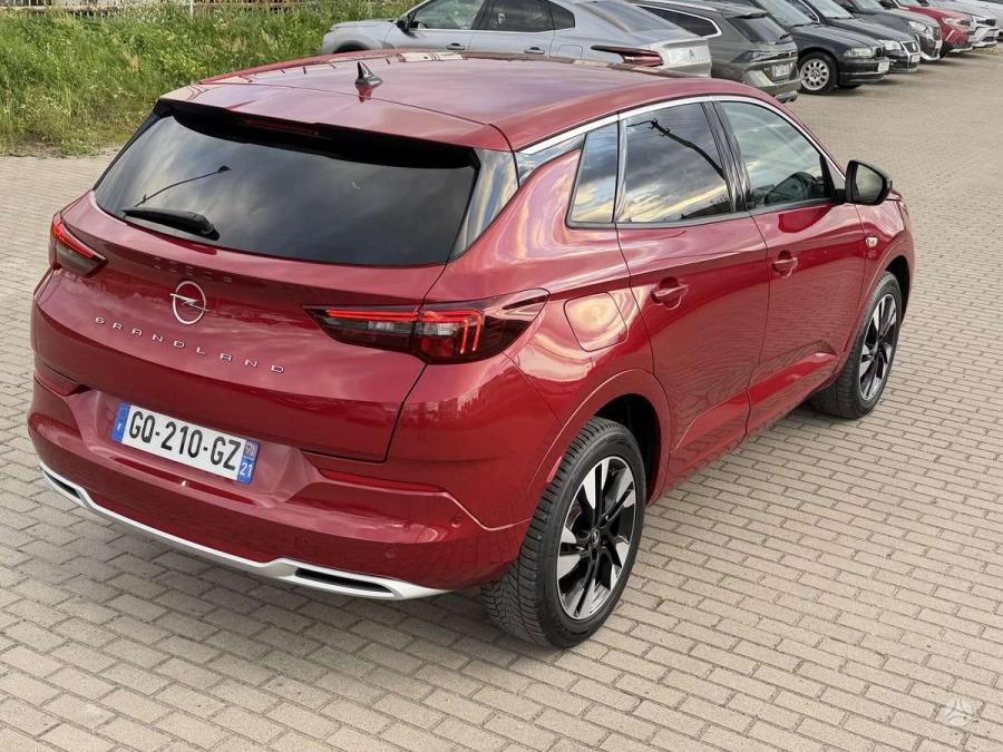 Red Opel Grandland 2023 in Marijampole, with an engine capacity of 1.20 L and mileage of 128 thousand km for 14762 €, photo 11 on AUTOMOTO.COM.LV