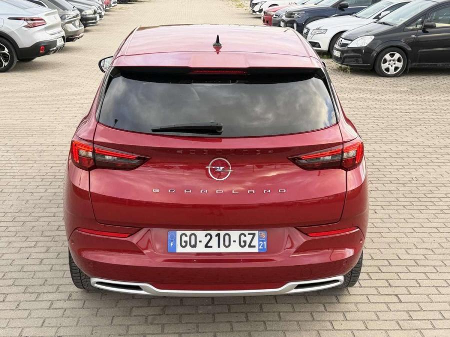 Red Opel Grandland 2023 in Marijampole, with an engine capacity of 1.20 L and mileage of 128 thousand km for 14762 €, photo 13 on AUTOMOTO.COM.LV