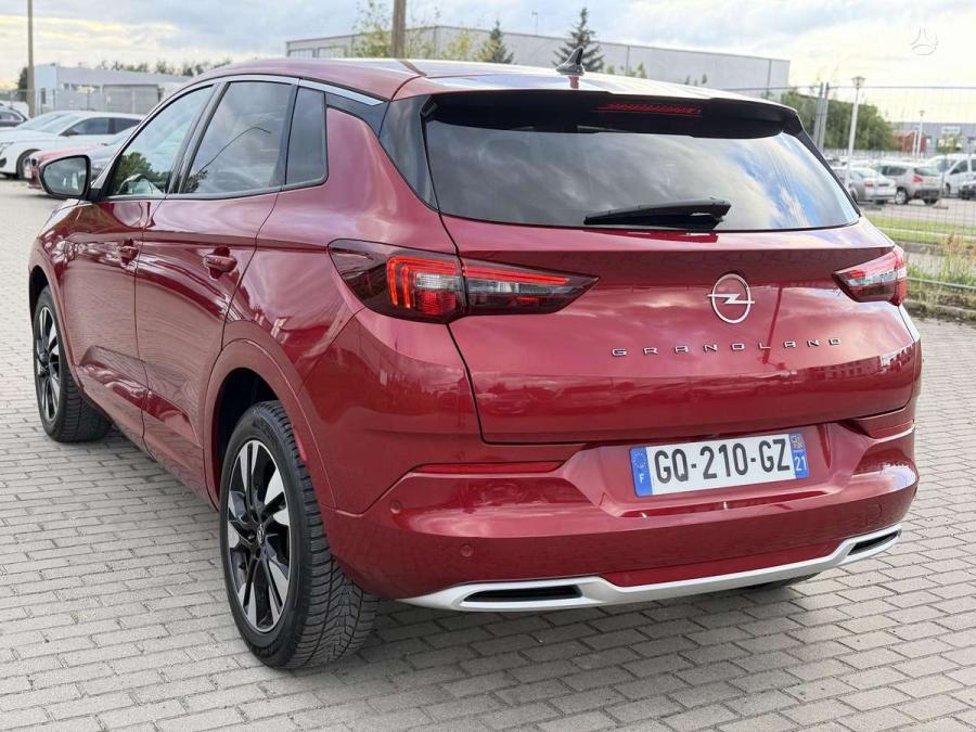 Red Opel Grandland 2023 in Marijampole, with an engine capacity of 1.20 L and mileage of 128 thousand km for 14762 €, photo 14 on AUTOMOTO.COM.LV