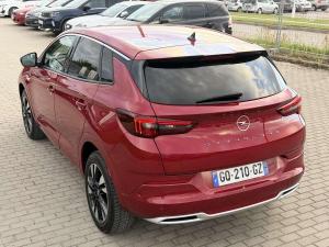 Red Opel Grandland 2023 in Marijampole, with an engine capacity of 1.20 L and mileage of 128 thousand km for 14762 €, photo 15 on AUTOMOTO.COM.LV