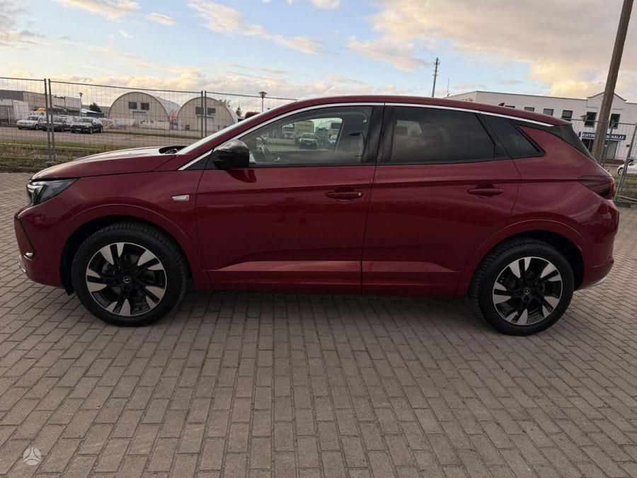 Red Opel Grandland 2023 in Marijampole, with an engine capacity of 1.20 L and mileage of 128 thousand km for 14762 €, photo 16 on AUTOMOTO.COM.LV