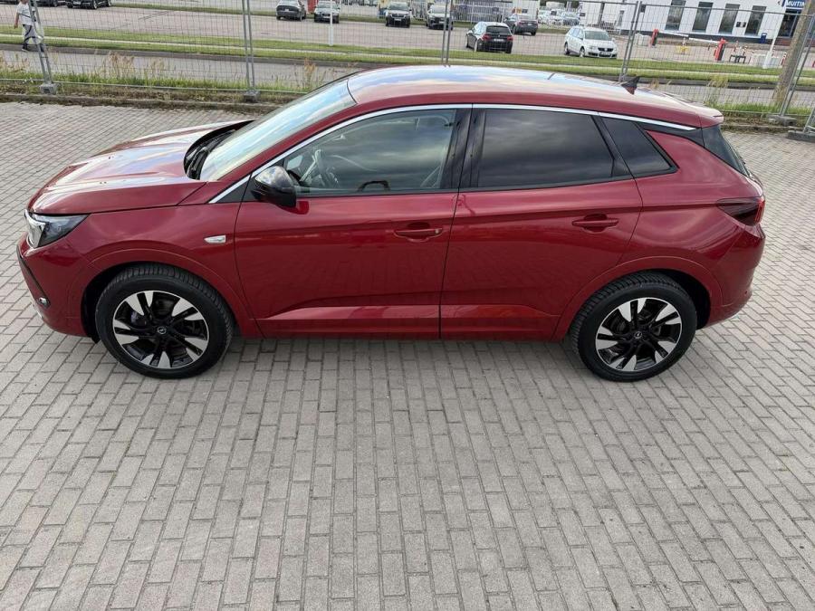 Red Opel Grandland 2023 in Marijampole, with an engine capacity of 1.20 L and mileage of 128 thousand km for 14762 €, photo 17 on AUTOMOTO.COM.LV