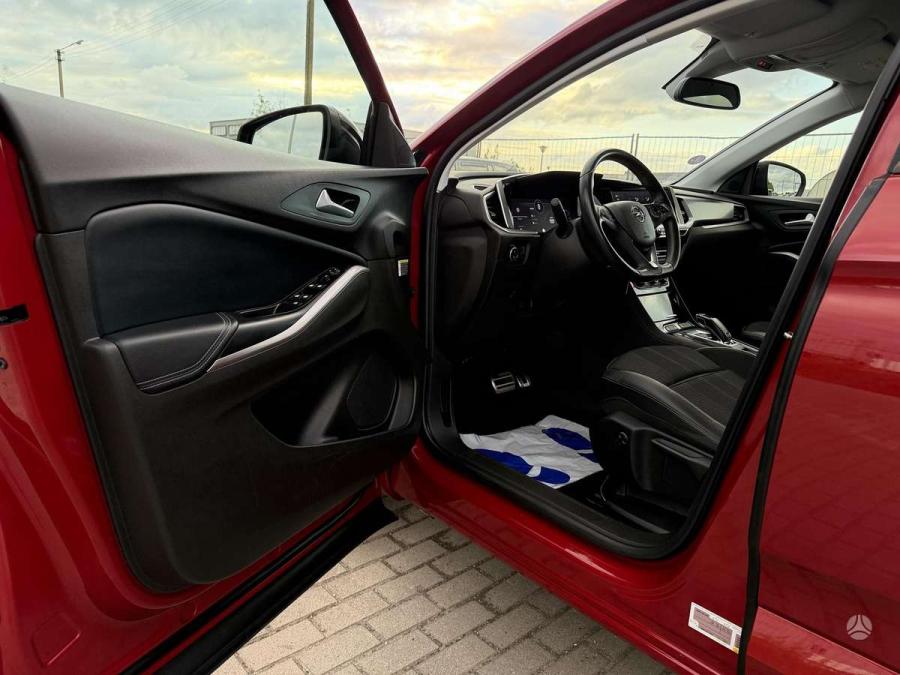 Red Opel Grandland 2023 in Marijampole, with an engine capacity of 1.20 L and mileage of 128 thousand km for 14762 €, photo 19 on AUTOMOTO.COM.LV