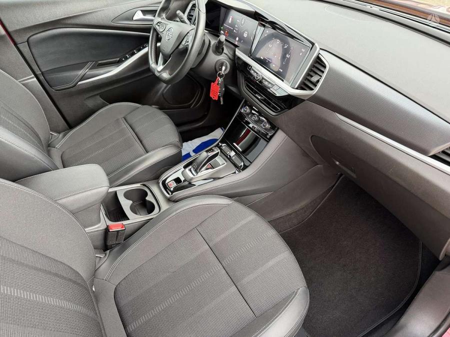 Red Opel Grandland 2023 in Marijampole, with an engine capacity of 1.20 L and mileage of 128 thousand km for 14762 €, photo 23 on AUTOMOTO.COM.LV