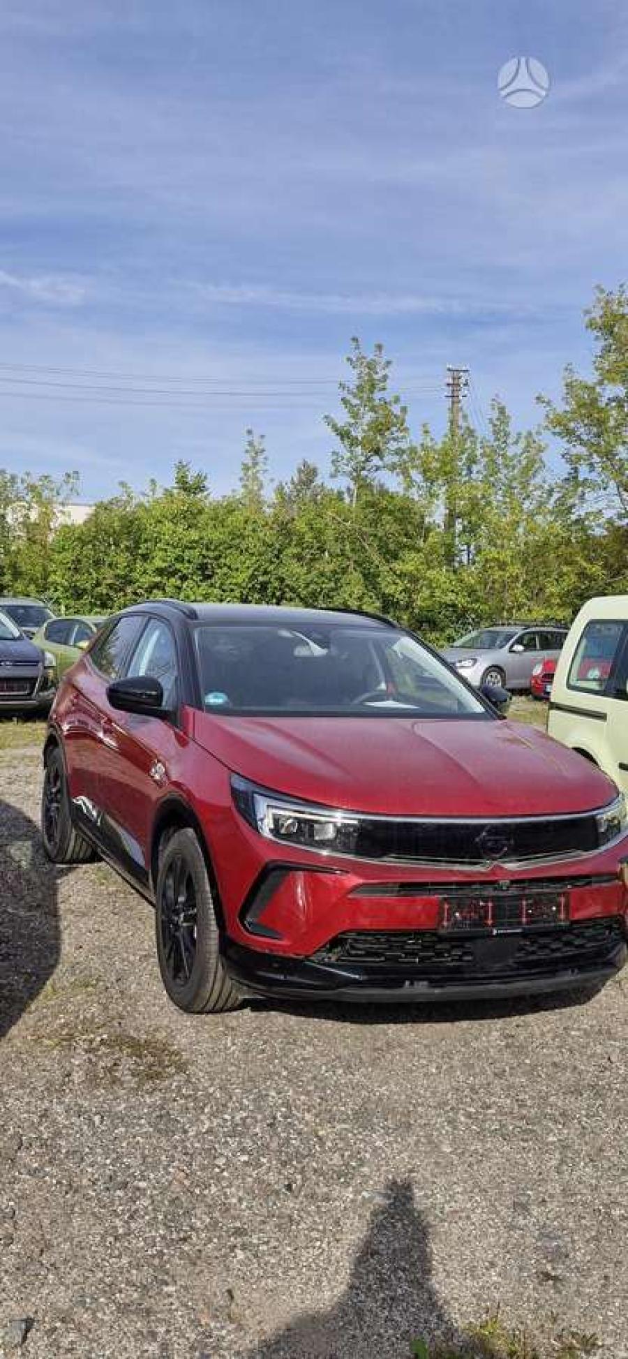 Red Opel Grandland 2024 in Kelme, with an engine capacity of 1.20 L and mileage of 9 thousand km for 11200 €, photo 1 on AUTOMOTO.COM.LV