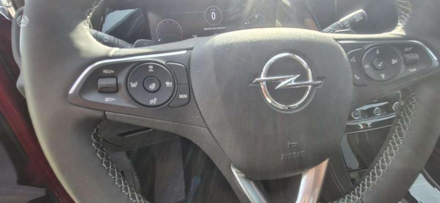 Red Opel Grandland 2024 in Kelme, with an engine capacity of 1.20 L and mileage of 9 thousand km for 11200 €, photo 15 on AUTOMOTO.COM.LV