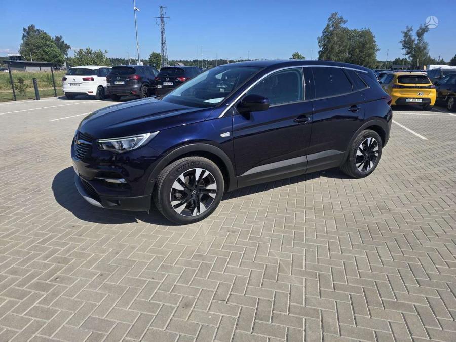 Blue Opel Grandland X 2019 in Taurage, with an engine capacity of 1.20 L and mileage of 103 thousand km for 9900 €, photo 1 on AUTOMOTO.COM.LV