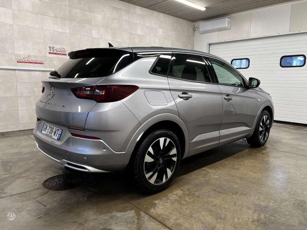 Grey Opel Grandland X 2023 in Marijampole, with an engine capacity of 1.20 L and mileage of 130 thousand km for 15004 €, photo 4 on AUTOMOTO.COM.LV