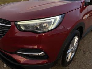 Red Opel Grandland X 2018 in Vilnius, with an engine capacity of 1.20 L and mileage of 228 thousand km for 8200 €, photo 14 on AUTOMOTO.COM.LV