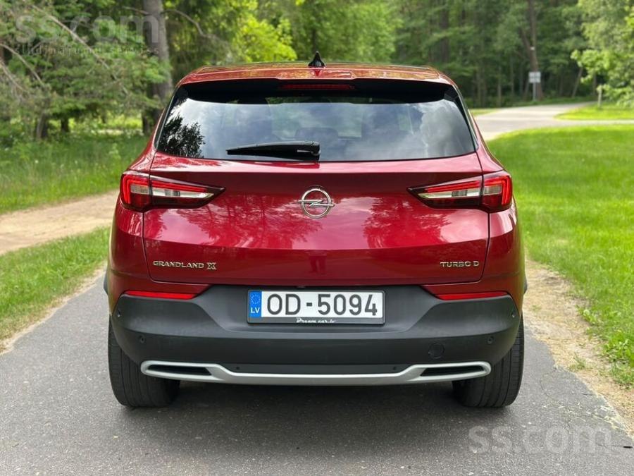 Красный Опель Grandland X 2018 в Рига, объемом двигателя 1.60 л и пробегом 160 тыс. км за 11770 €, фото 6 на AUTOMOTO.COM.LV