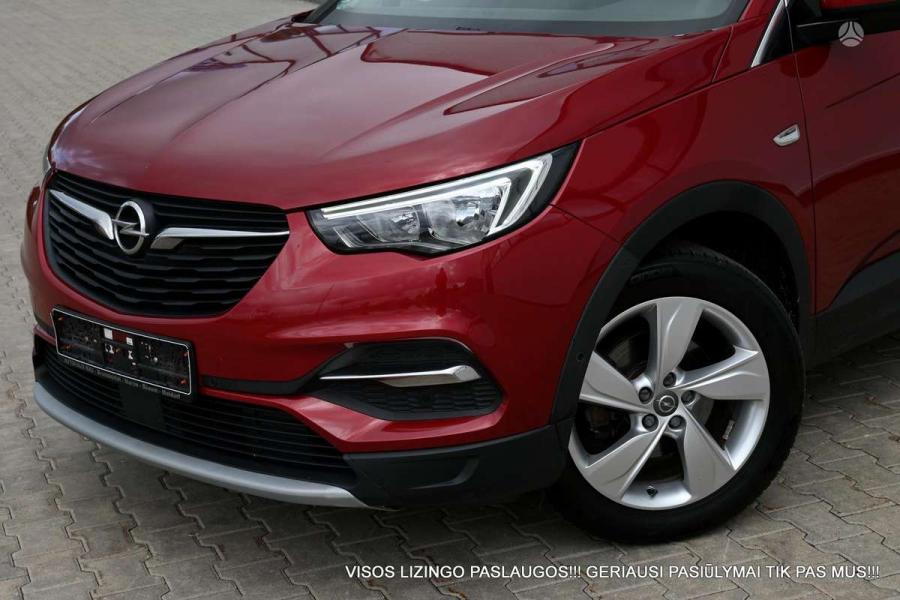 Red Opel Grandland X 2018 in Kretinga, with an engine capacity of 1.20 L and mileage of 143 thousand km for 8599 €, photo 5 on AUTOMOTO.COM.LV