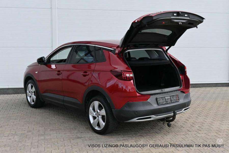 Red Opel Grandland X 2018 in Kretinga, with an engine capacity of 1.20 L and mileage of 143 thousand km for 8599 €, photo 12 on AUTOMOTO.COM.LV