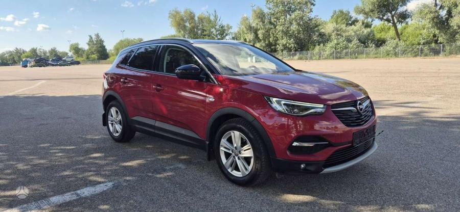Red Opel Grandland X 2018 in Marijampole, with an engine capacity of 2.00 L and mileage of 172 thousand km for 10950 €, photo 1 on AUTOMOTO.COM.LV