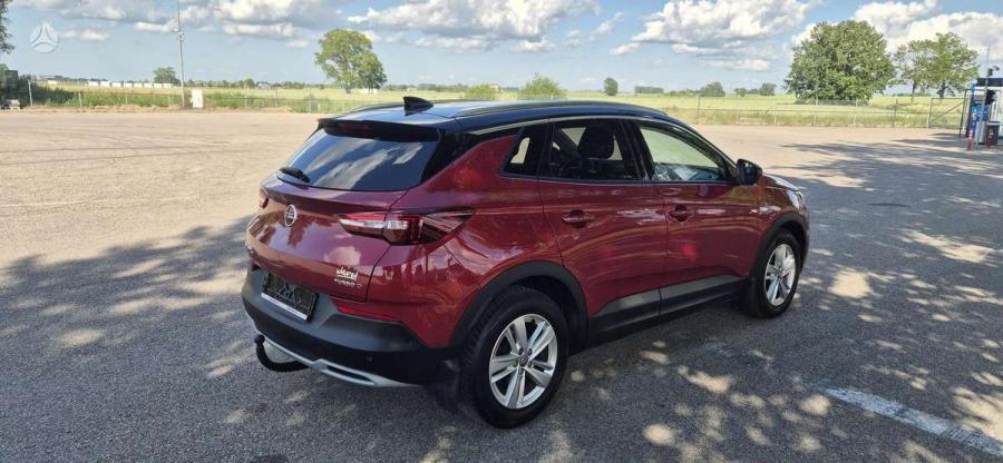 Red Opel Grandland X 2018 in Marijampole, with an engine capacity of 2.00 L and mileage of 172 thousand km for 10950 €, photo 4 on AUTOMOTO.COM.LV