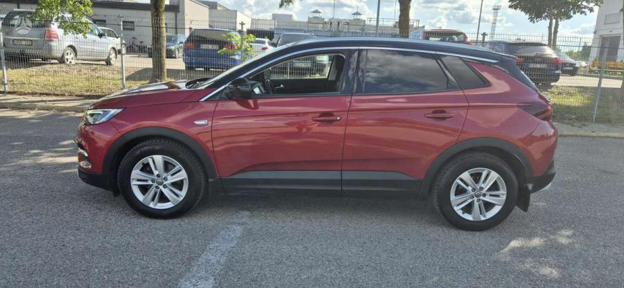 Red Opel Grandland X 2018 in Marijampole, with an engine capacity of 2.00 L and mileage of 172 thousand km for 10950 €, photo 7 on AUTOMOTO.COM.LV