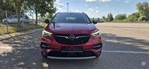 Red Opel Grandland X 2018 in Marijampole, with an engine capacity of 2.00 L and mileage of 172 thousand km for 10950 €, photo 9 on AUTOMOTO.COM.LV