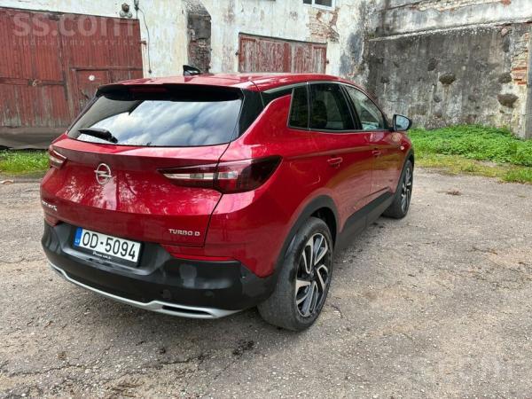 Red Opel Grandland X 2018 in Liepaja, with an engine capacity of 1.60 L and mileage of 167 thousand km for 10500 €, photo 6 on AUTOMOTO.COM.LV