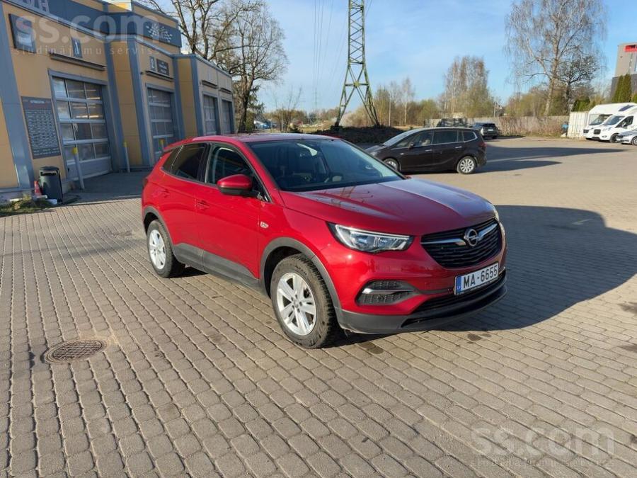 Red Opel Grandland X 2019 in Riga, with an engine capacity of 1.20 L and mileage of 80 thousand km for 14700 €, photo 1 on AUTOMOTO.COM.LV