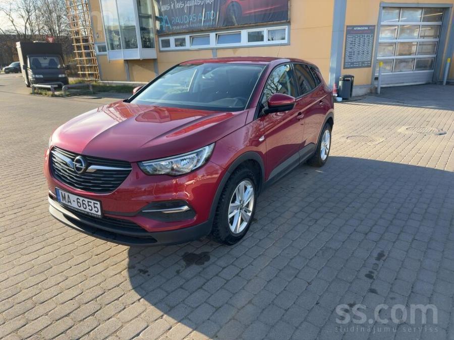 Red Opel Grandland X 2019 in Riga, with an engine capacity of 1.20 L and mileage of 80 thousand km for 14700 €, photo 4 on AUTOMOTO.COM.LV