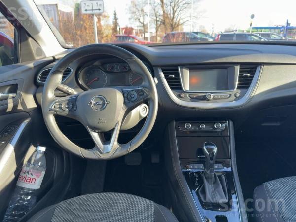 Red Opel Grandland X 2019 in Riga, with an engine capacity of 1.20 L and mileage of 80 thousand km for 14700 €, photo 7 on AUTOMOTO.COM.LV