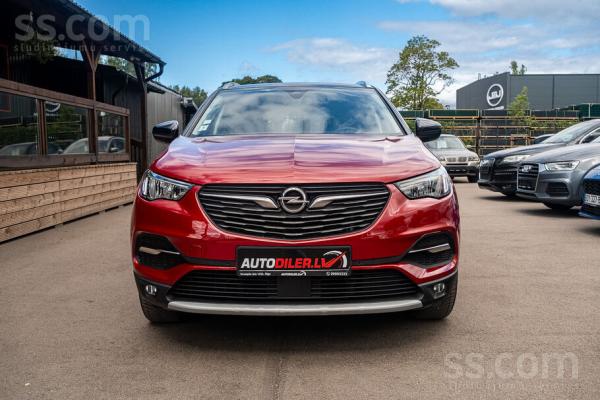 Red Opel Grandland X 2019 in Riga, with an engine capacity of 1.20 L and mileage of 0 thousand km for 12500 €, photo 2 on AUTOMOTO.COM.LV