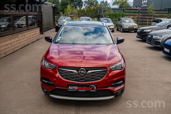 Red Opel Grandland X 2019 in Riga, with an engine capacity of 1.20 L and mileage of 0 thousand km for 12500 €, photo 3 on AUTOMOTO.COM.LV