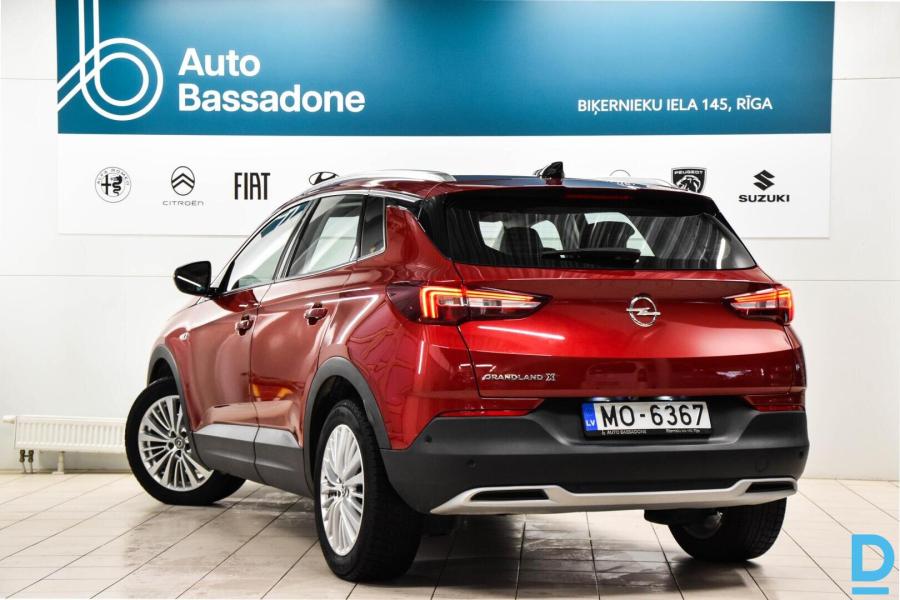 Red Opel Grandland X 2020 in Riga, with an engine capacity of 1.20 L and mileage of 92 thousand km for 15990 €, photo 2 on AUTOMOTO.COM.LV
