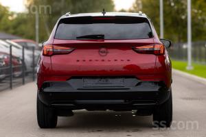Red Opel Grandland X 2022 in Jelgava, with an engine capacity of 1.50 L and mileage of 0 thousand km for 17500 €, photo 6 on AUTOMOTO.COM.LV