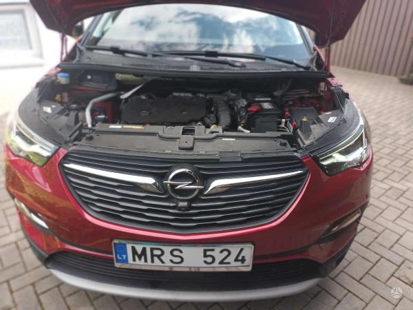 Red Opel Grandland X 2021 in Telschi, with an engine capacity of 0.00 L and mileage of 147 thousand km for 12500 €, photo 8 on AUTOMOTO.COM.LV