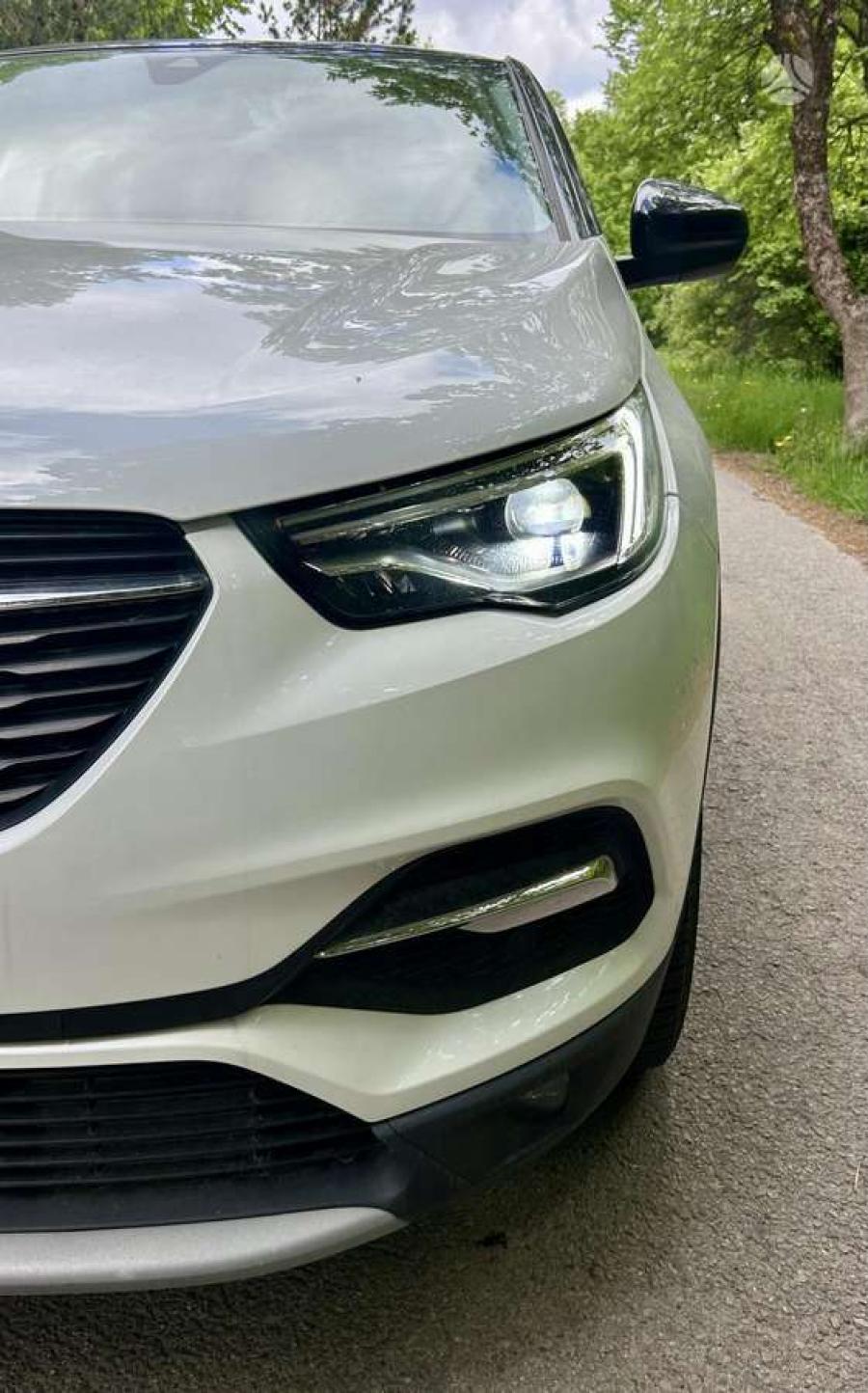 White Opel Grandland X 2018 in Taurage, with an engine capacity of 2.00 L and mileage of 258 thousand km for 11800 €, photo 24 on AUTOMOTO.COM.LV