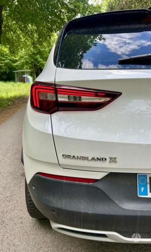 White Opel Grandland X 2018 in Taurage, with an engine capacity of 2.00 L and mileage of 258 thousand km for 11800 €, photo 25 on AUTOMOTO.COM.LV