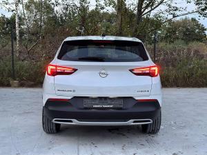 White Opel Grandland X 2021 in Vilnius, with an engine capacity of 1.60 L and mileage of 170 thousand km for 14290 €, photo 6 on AUTOMOTO.COM.LV