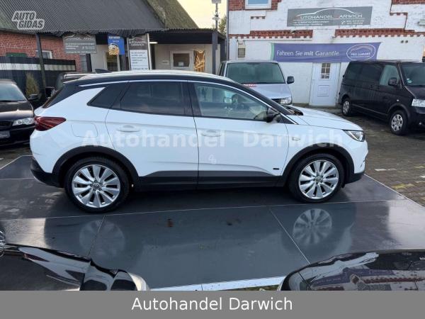 White Opel Grandland X 2021 in Kaunas, with an engine capacity of 1.60 L and mileage of 84 thousand km for 22390 €, photo 6 on AUTOMOTO.COM.LV