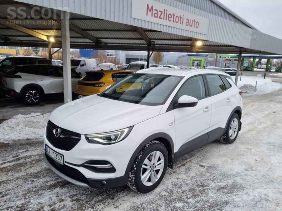 White Opel Grandland X 2021 in Riga, with an engine capacity of 1.20 L and mileage of 68 thousand km for 14900 €, photo 1 on AUTOMOTO.COM.LV