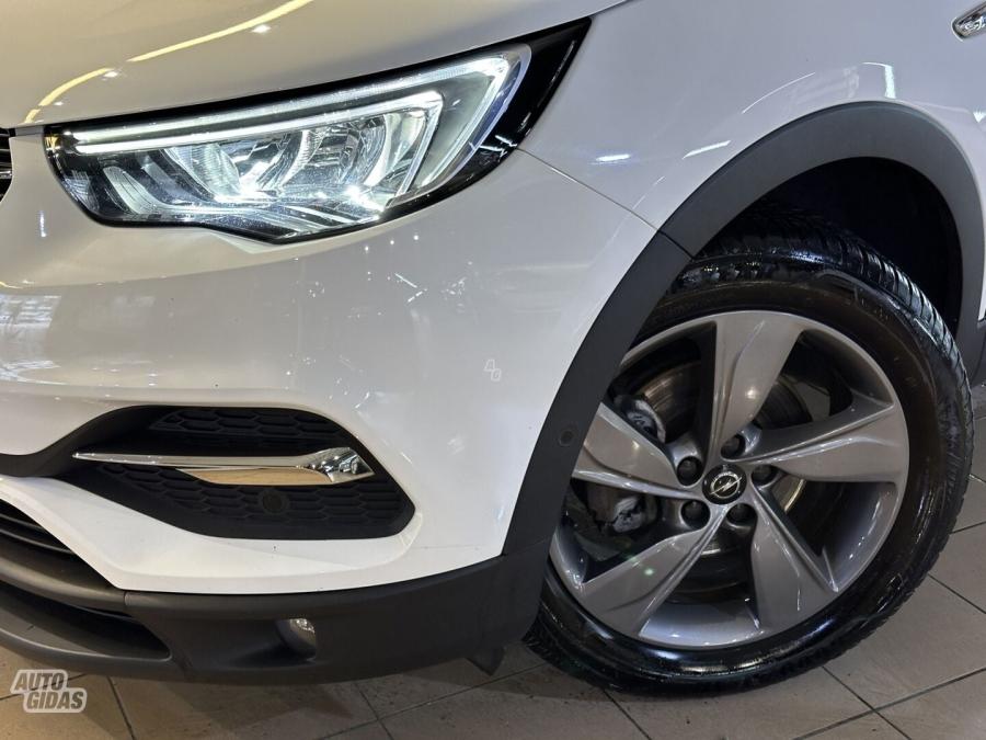 White Opel Grandland X 2021 in Avizieniai, with an engine capacity of 1.50 L and mileage of 120 thousand km for 13990 €, photo 4 on AUTOMOTO.COM.LV