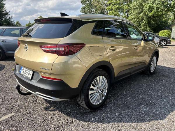 Yellow Opel Grandland X 2018 in Siauliai, with an engine capacity of 1.56 L and mileage of 178 thousand km for 9900 €, photo 4 on AUTOMOTO.COM.LV