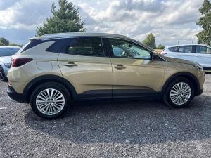 Yellow Opel Grandland X 2018 in Siauliai, with an engine capacity of 1.56 L and mileage of 178 thousand km for 9900 €, photo 6 on AUTOMOTO.COM.LV