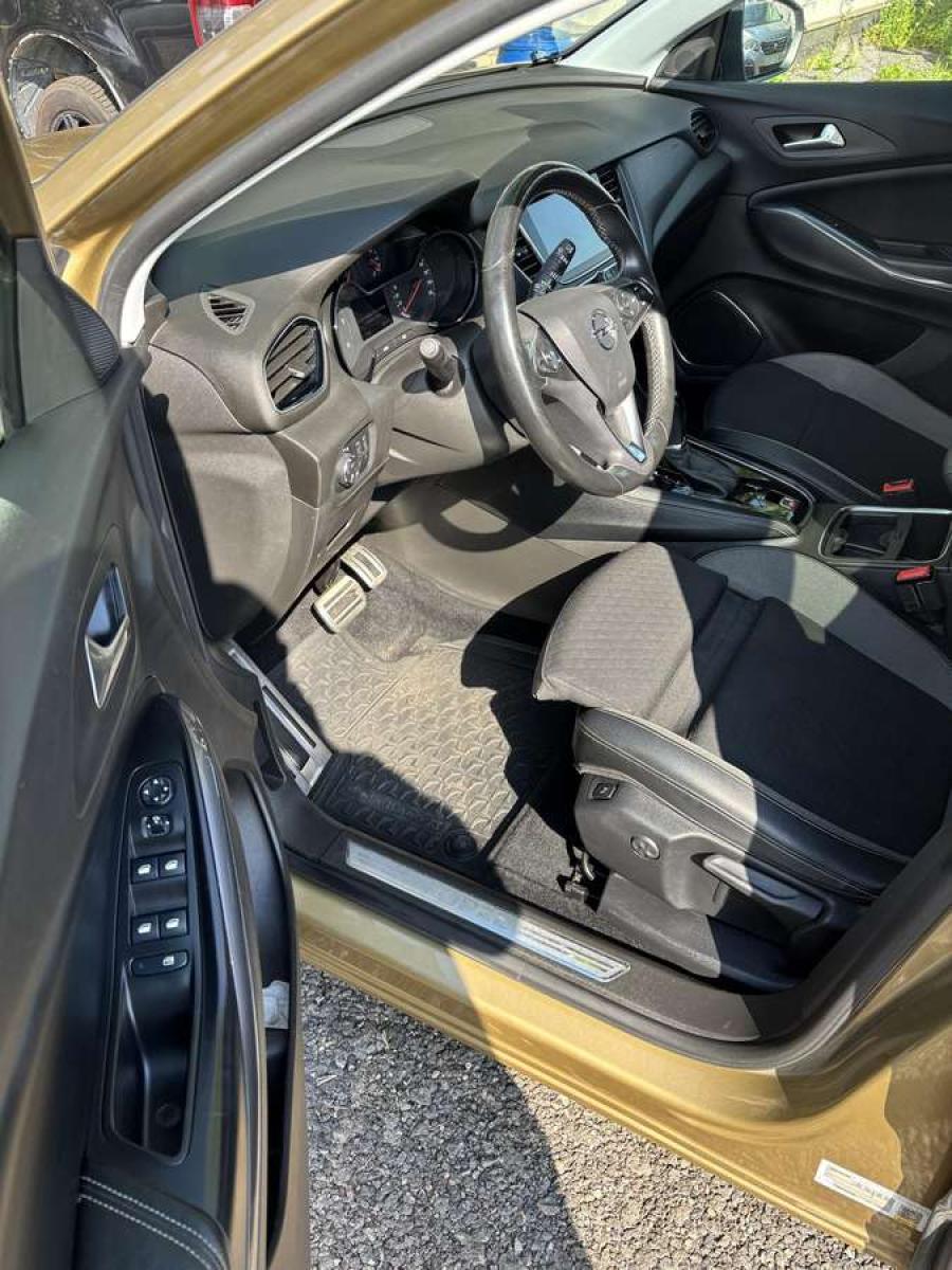 Yellow Opel Grandland X 2018 in Siauliai, with an engine capacity of 1.56 L and mileage of 178 thousand km for 9900 €, photo 10 on AUTOMOTO.COM.LV