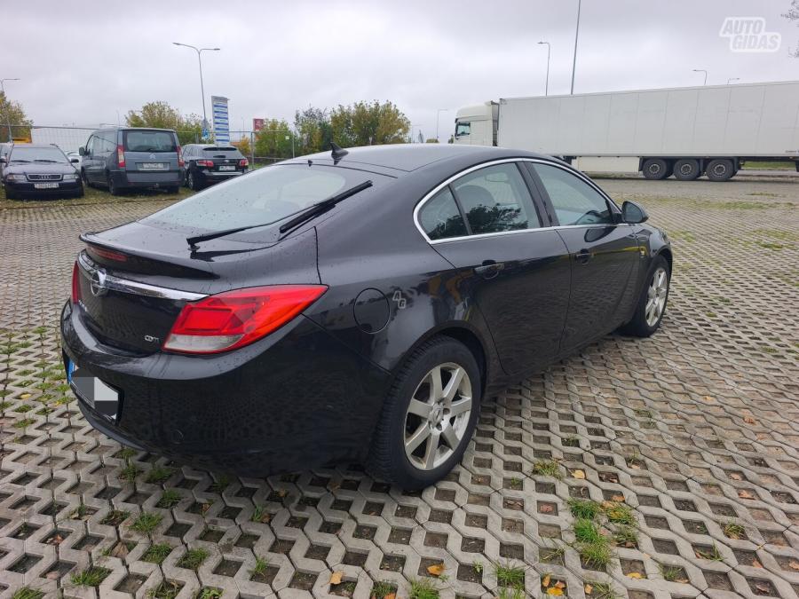 Black Opel Insignia 2008 in Vilnius, with an engine capacity of 2.00 L and mileage of 230 thousand km for 1950 €, photo 6 on AUTOMOTO.COM.LV